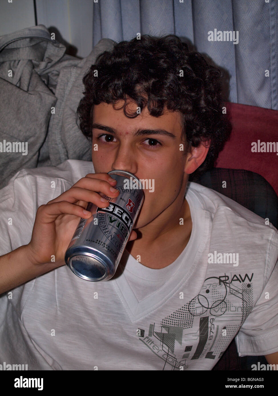 15 year old teenager drinking alcohol Stock Photo - Alamy