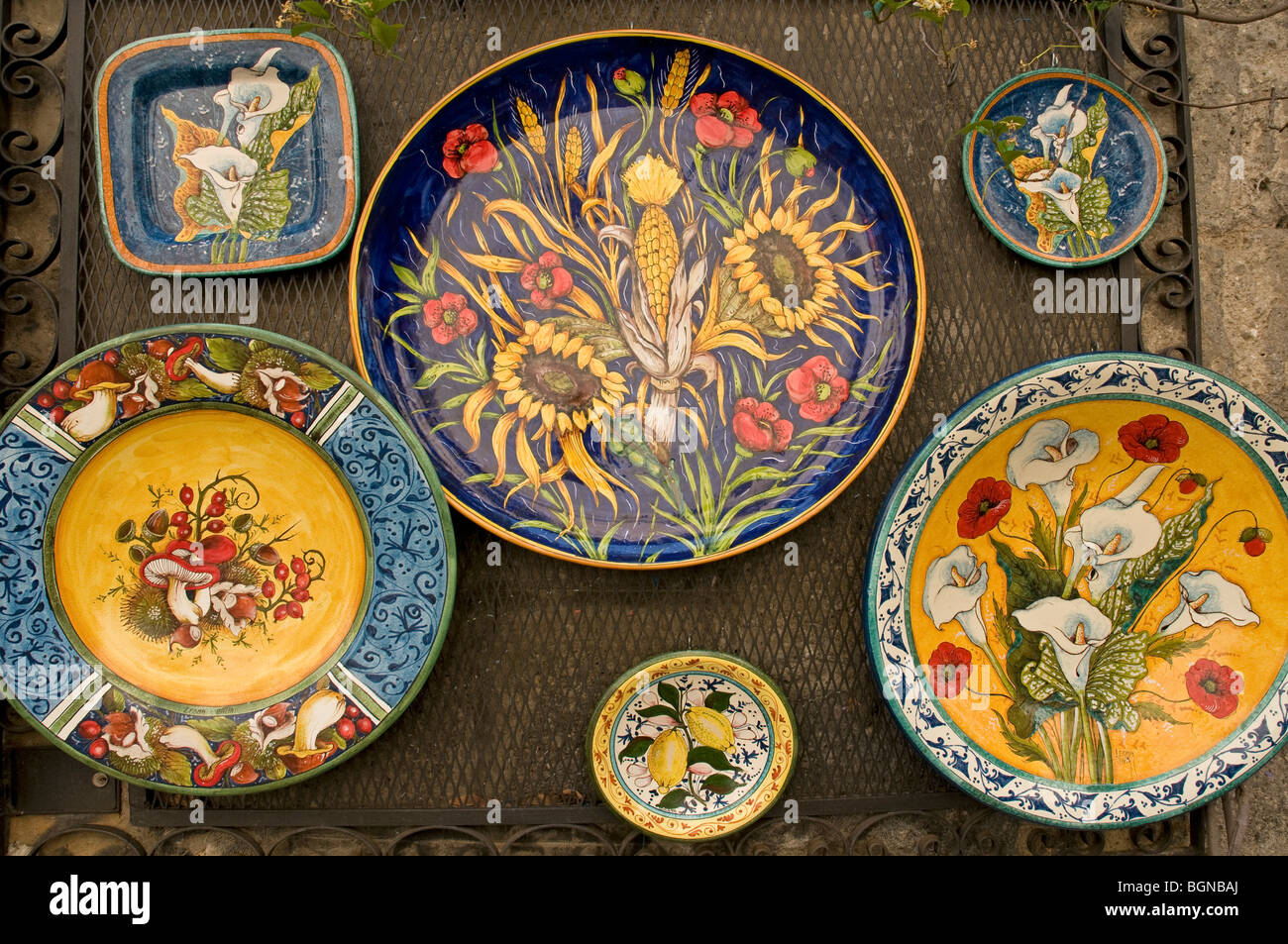 Colourful array of ceramics decorate a shop front in Orvieto, Umbria ...