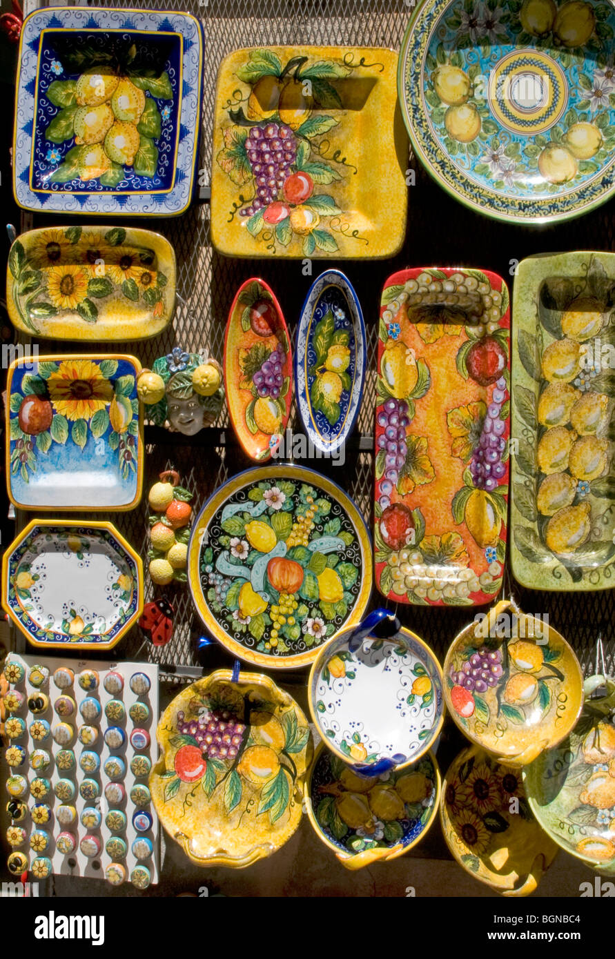 Colourful array of ceramics decorate a shop front in Orvieto, Umbria ...