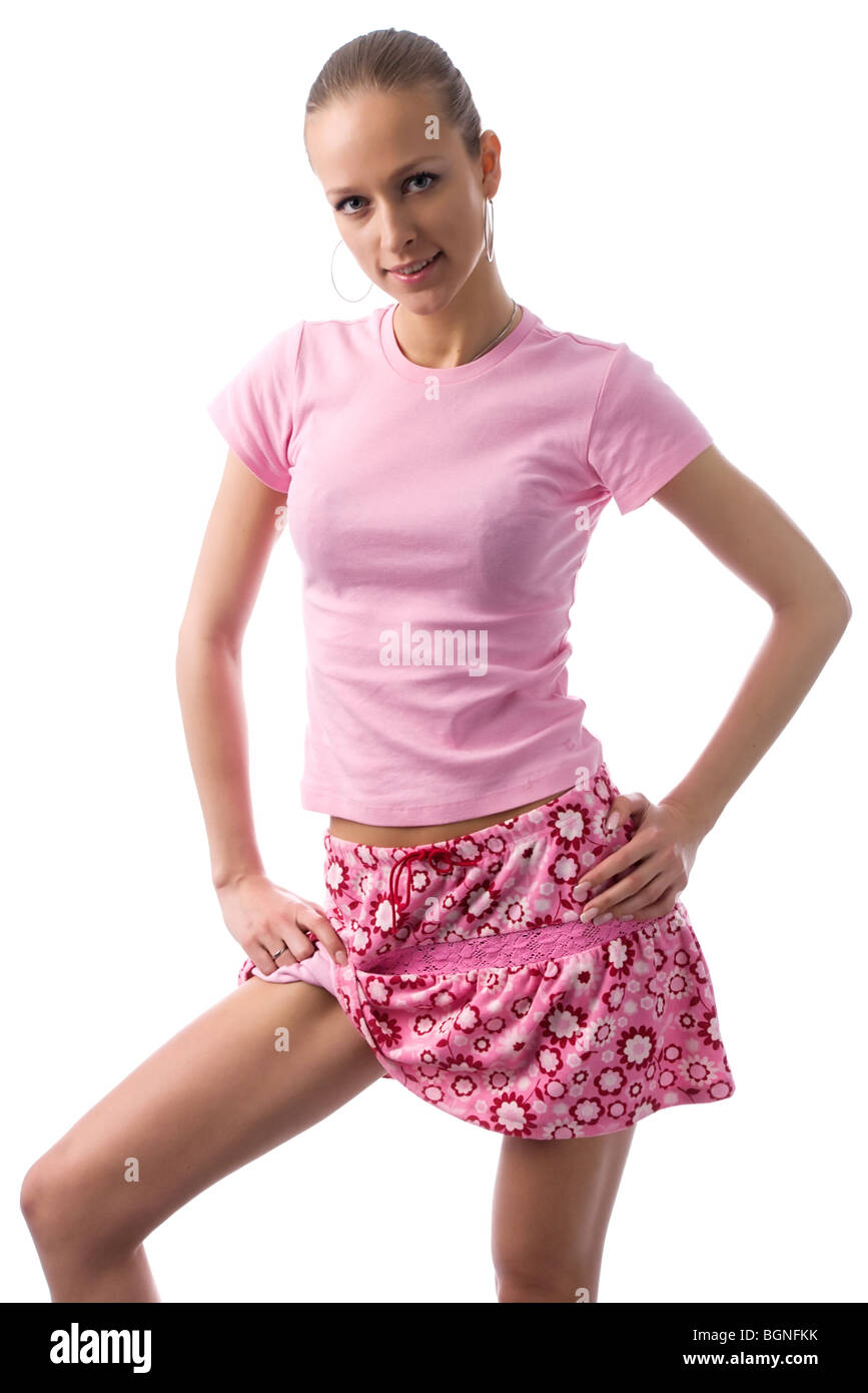 Young Beautiful Woman Standing In Seductive Pose In Pink T Shirt And