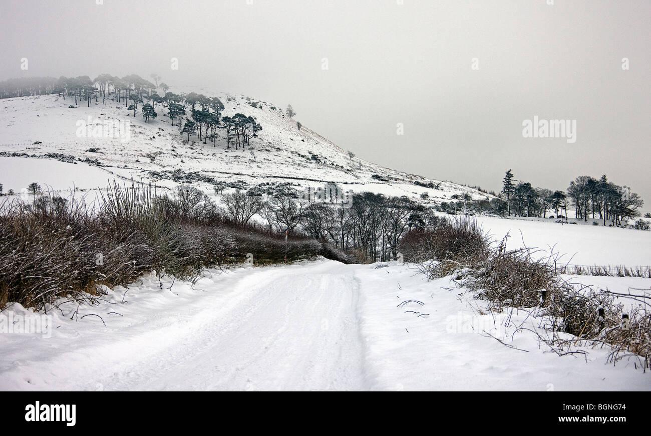 Heavy snow on back road road in Northumberland. 2010 Stock Photo - Alamy