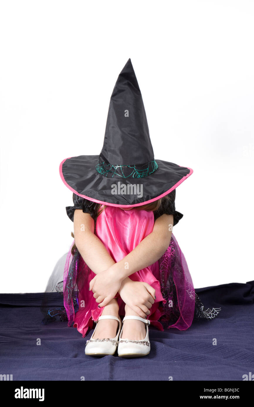 little cute angry girl in carnival fancy dress on the eve of Halloween ...