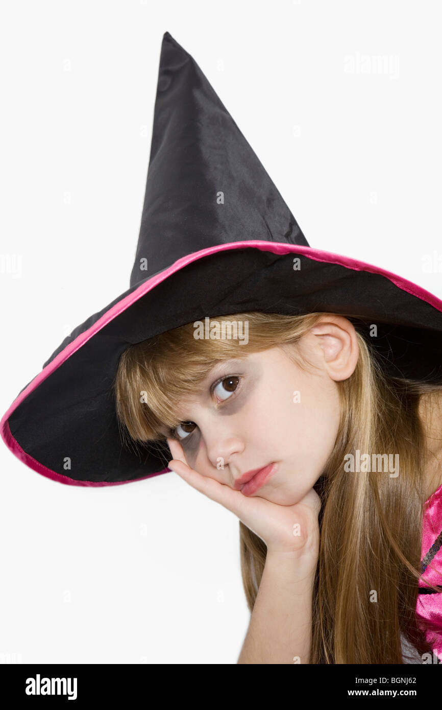 little cute angry girl in carnival fancy dress on the eve of Halloween ...