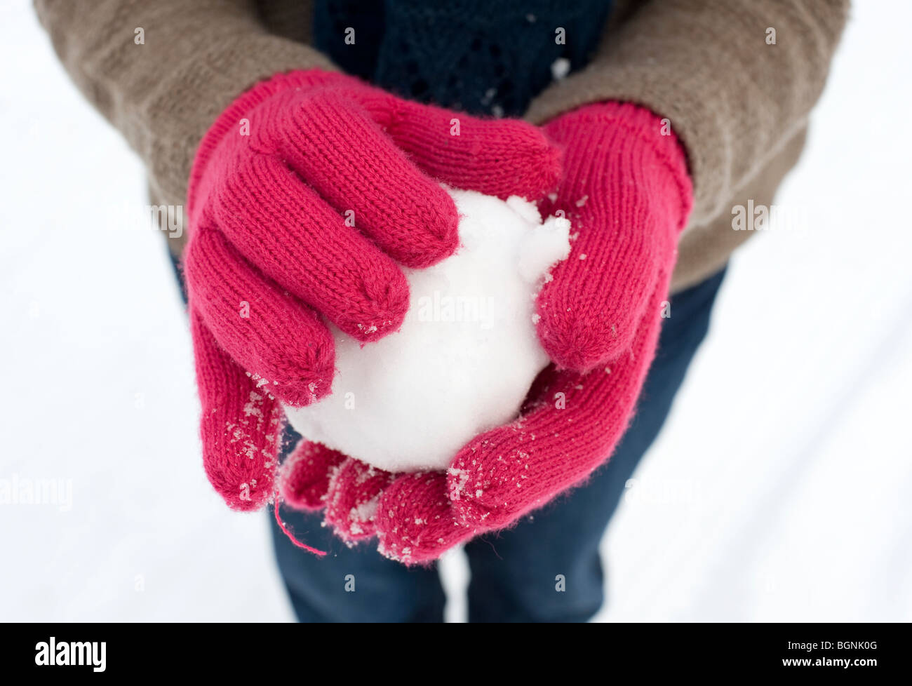 Hands and snowballs hi-res stock photography and images - Alamy