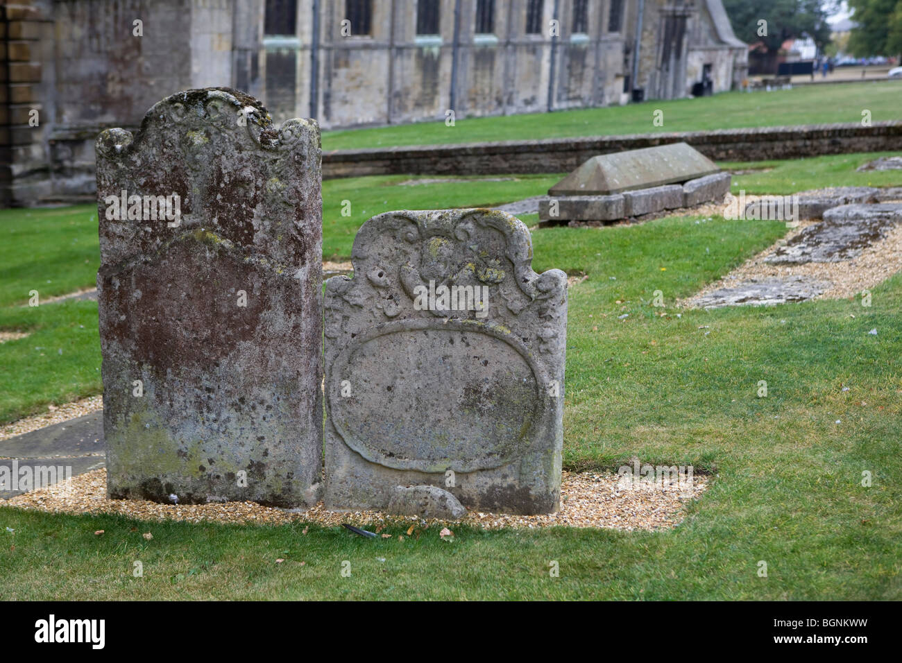 Lichen covered medieval graves of Eli cathedral in England Stock Photo ...