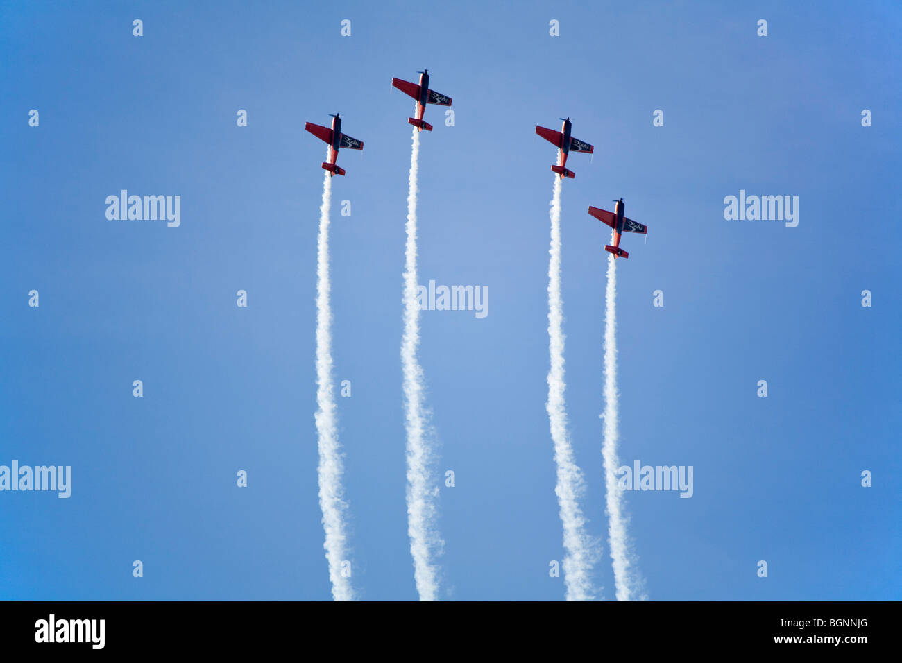 Blades aerobatic display team flying Extra 300 LP aircraft at RAF ...