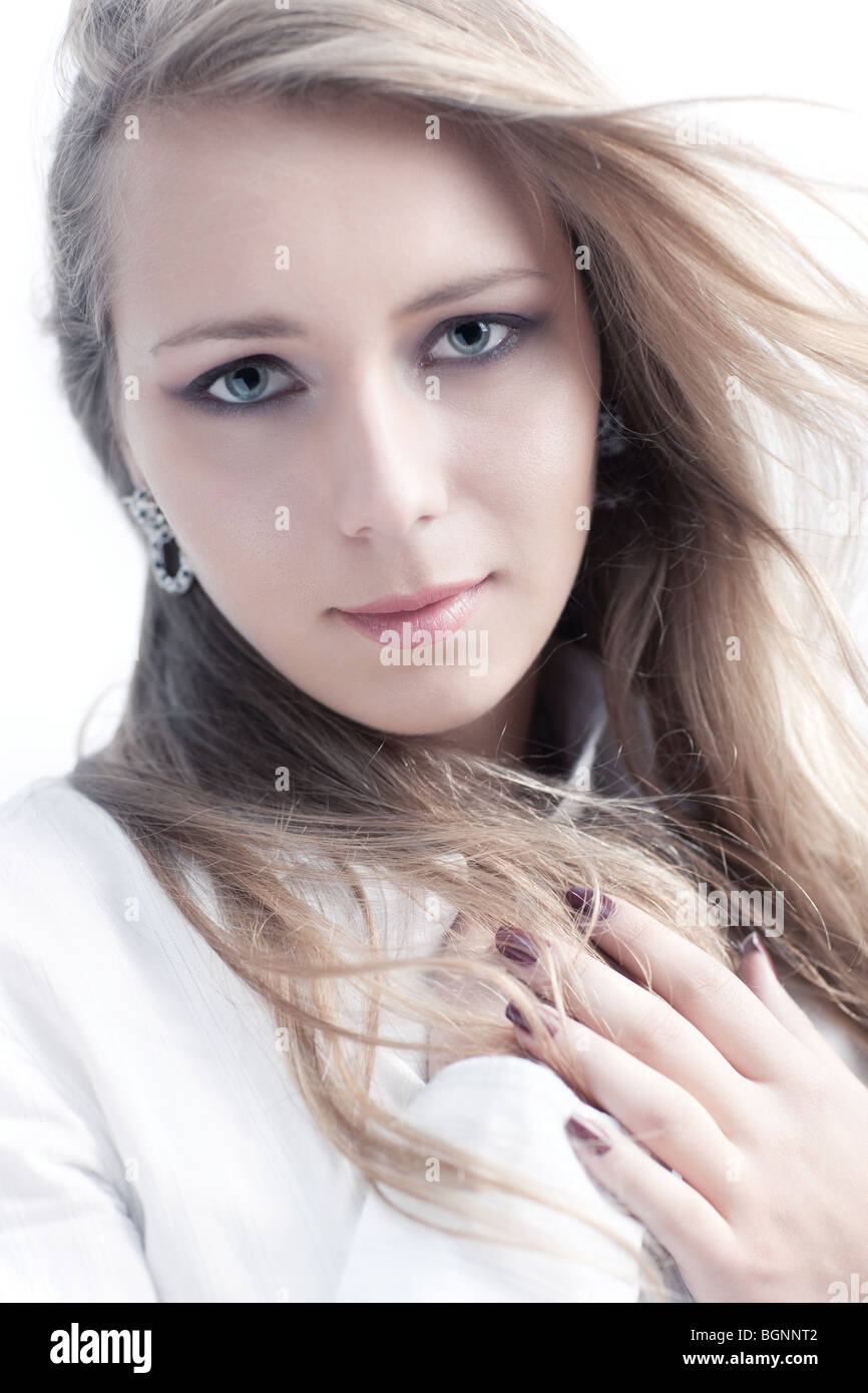 Young woman on white background portrait. High key effect Stock Photo ...