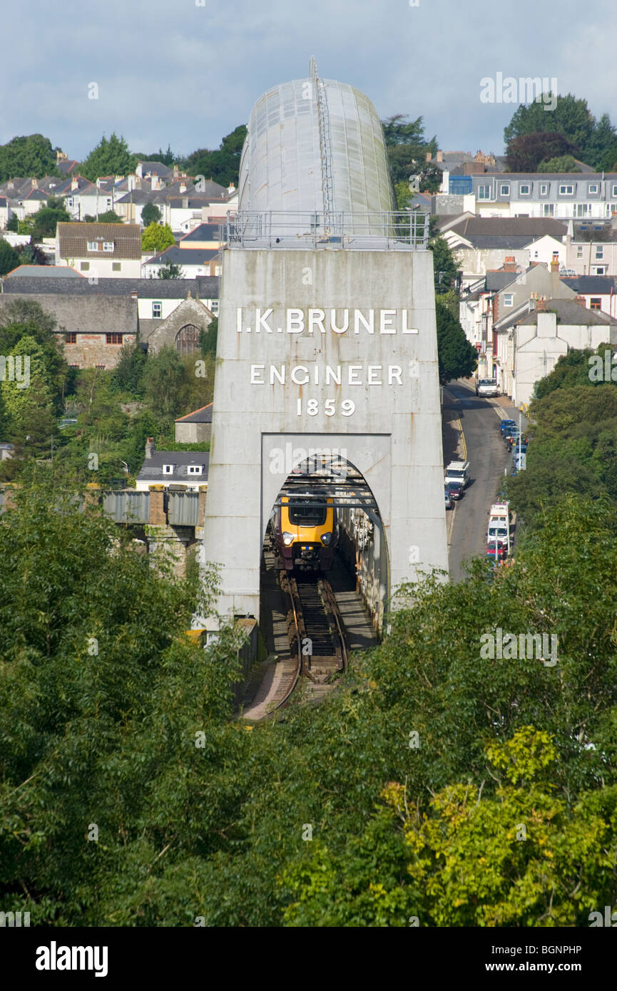 A train appearing at the Devon side of the railway bridge across the ...