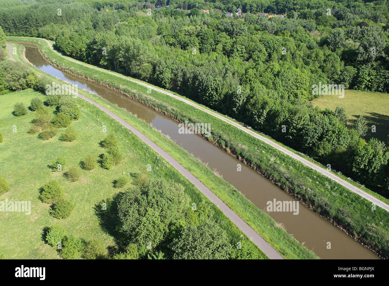 Fields, grasslands and forested area along river Demer, valley of Demer ...