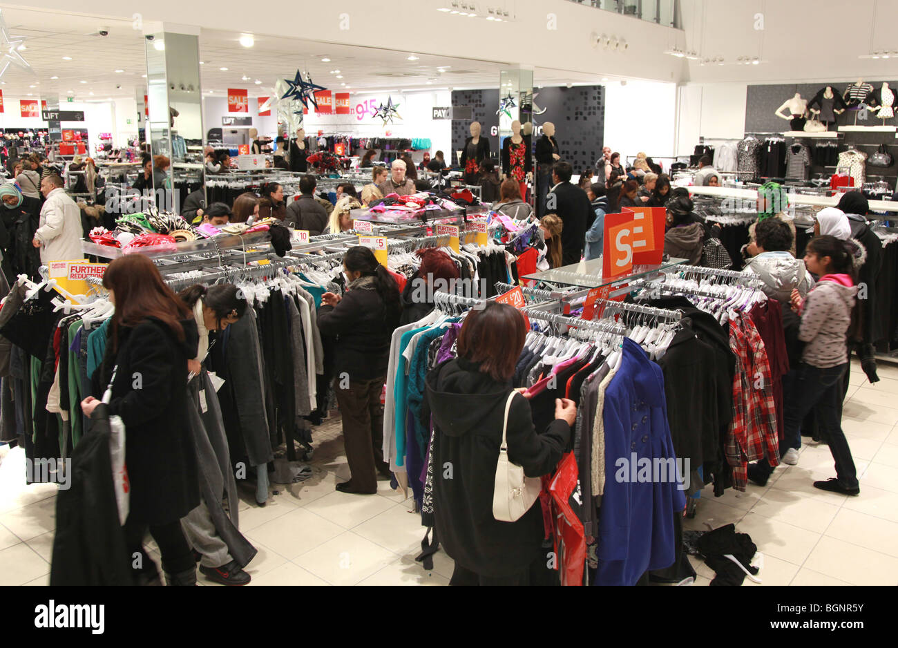 Shoppers at the Sales Stock Photo - Alamy