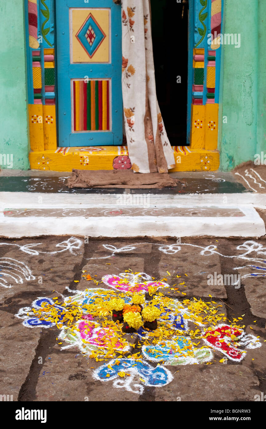 Rangoli design infront of a rural indian house on the festival day of ...