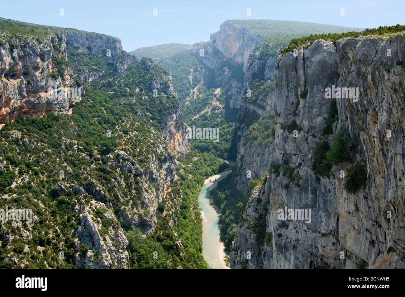 The steep limestone cliff faces of the canyon Gorges du Verdon / Verdon ...