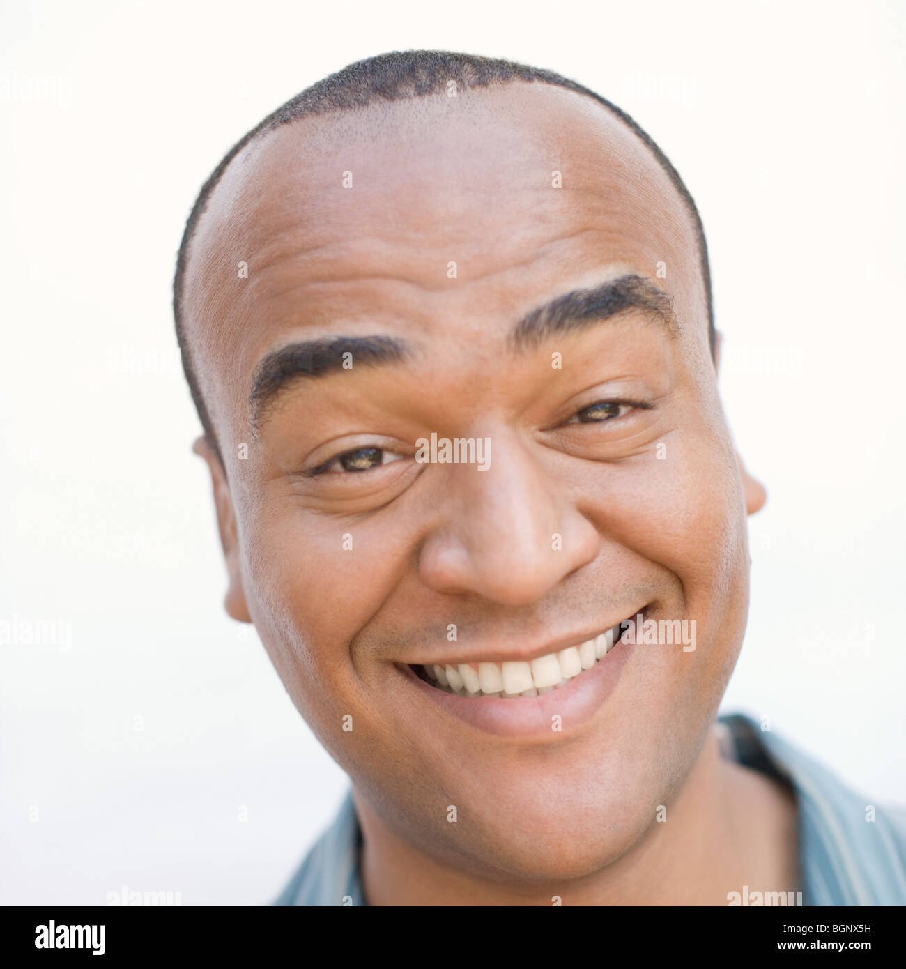 Portrait of a mid adult man smiling Stock Photo - Alamy