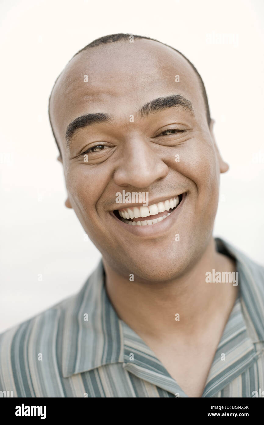 Portrait of a mid adult man smiling Stock Photo - Alamy