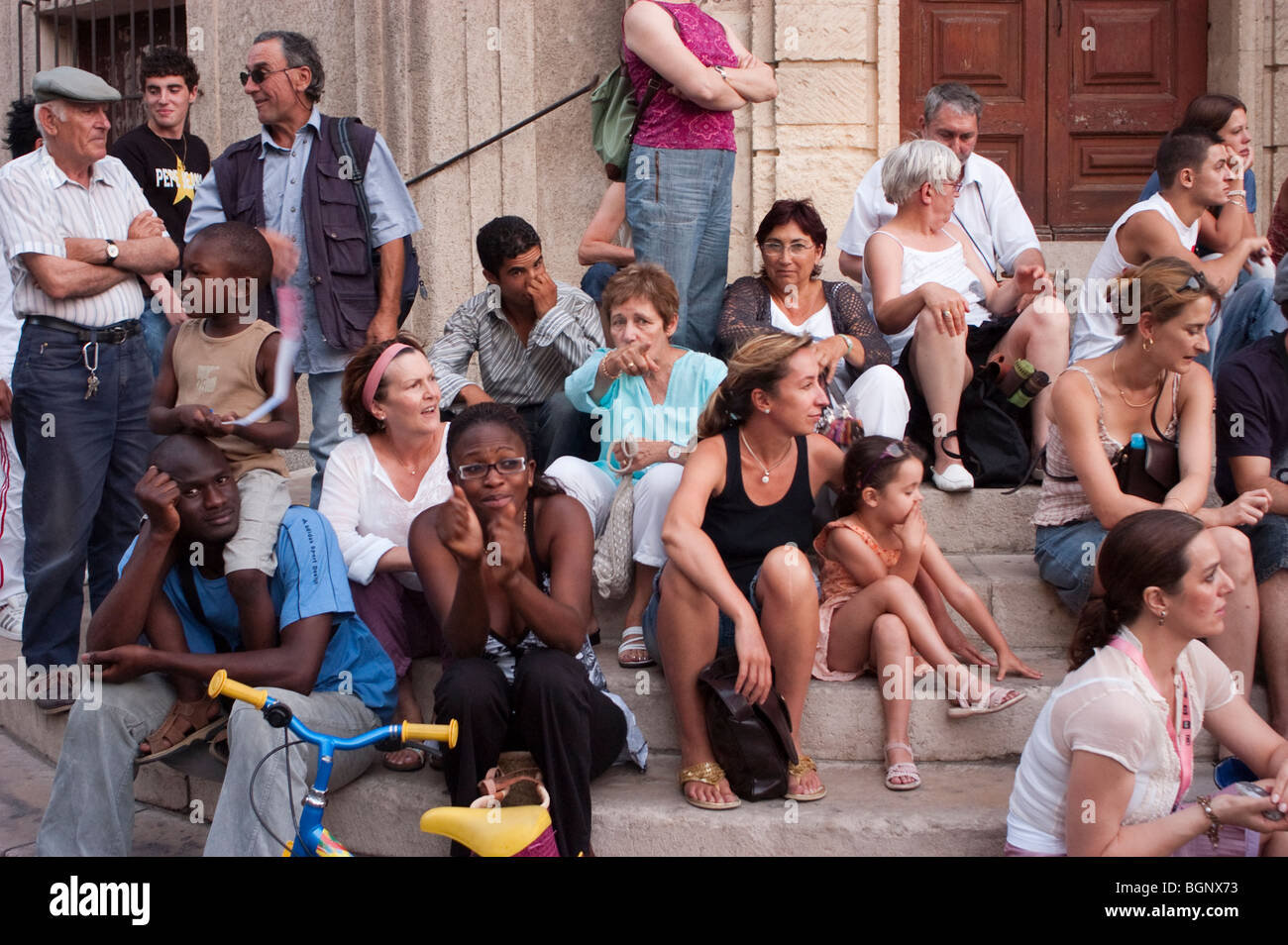 Arles, France, Large Crowd Scene, people Sitting on Steps Outside City ...