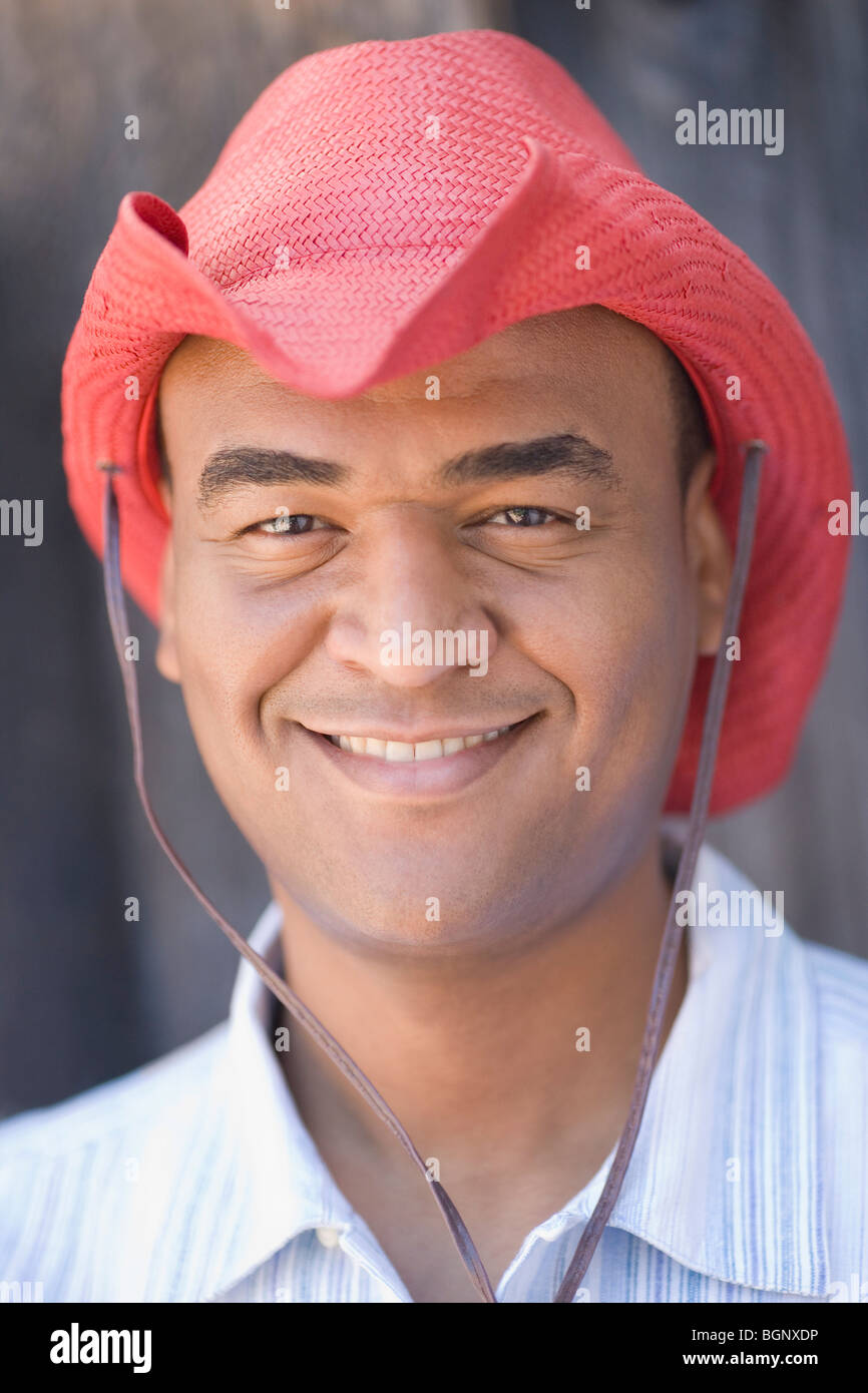 Portrait of a mid adult man wearing a cowboy hat and smiling Stock ...