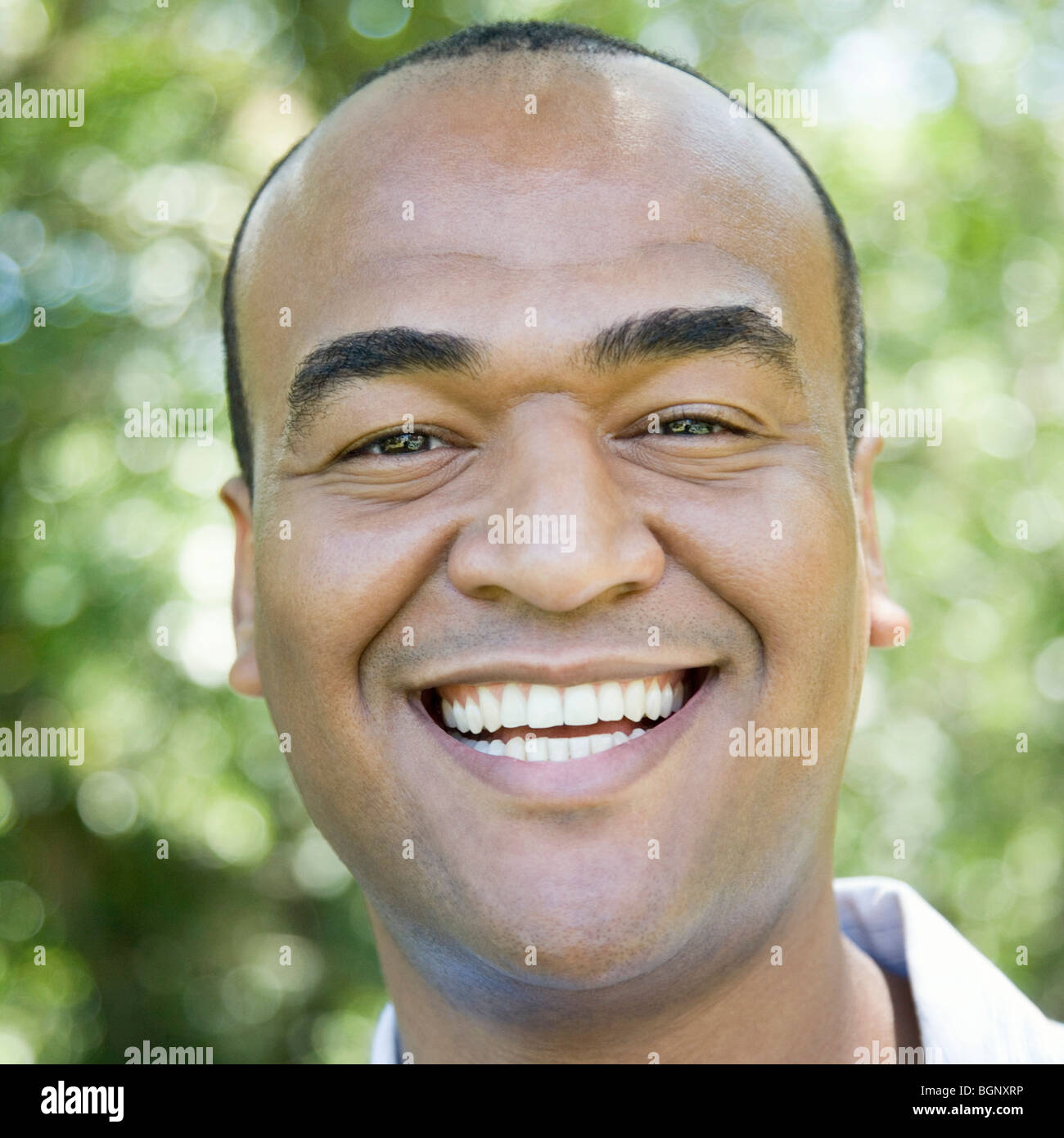 Portrait of a mid adult man smiling Stock Photo - Alamy