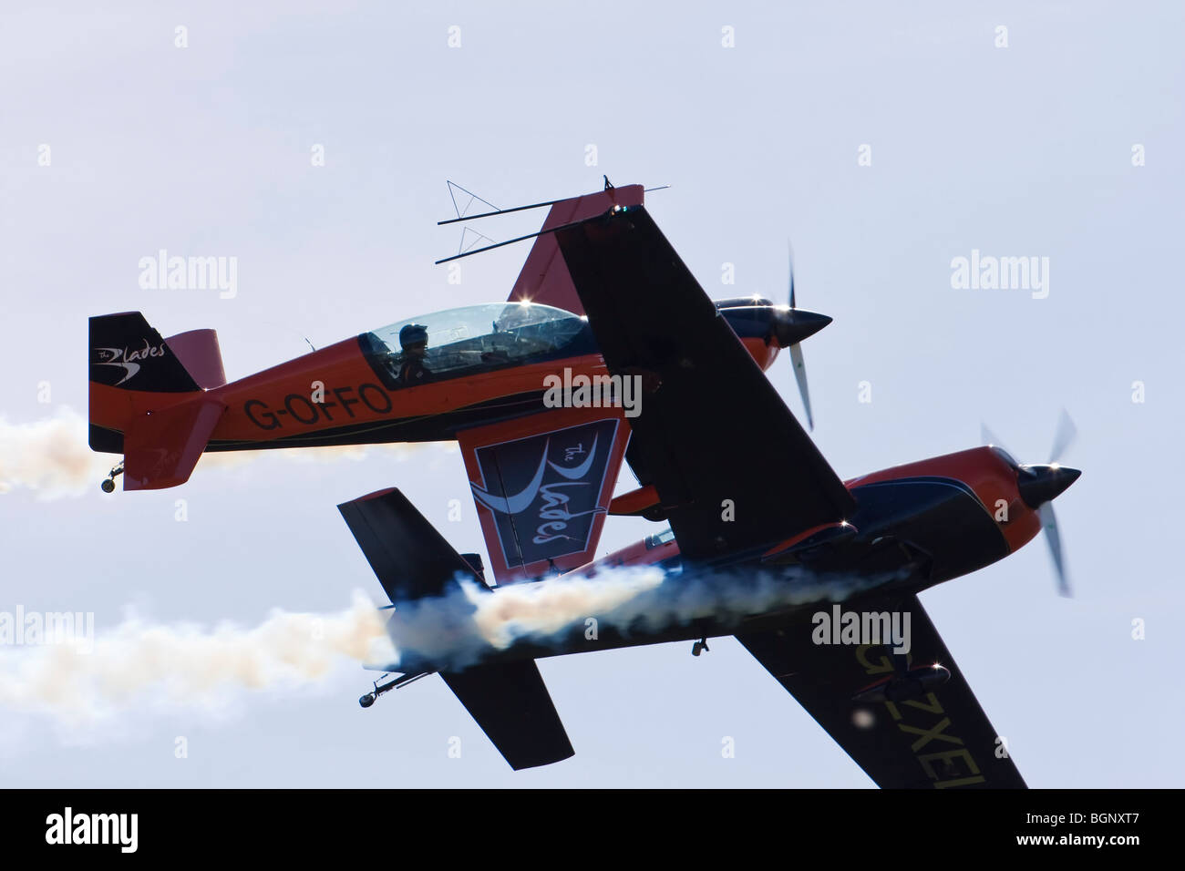 Blades aerobatic display team flying Extra 300 LP aircraft at RAF ...