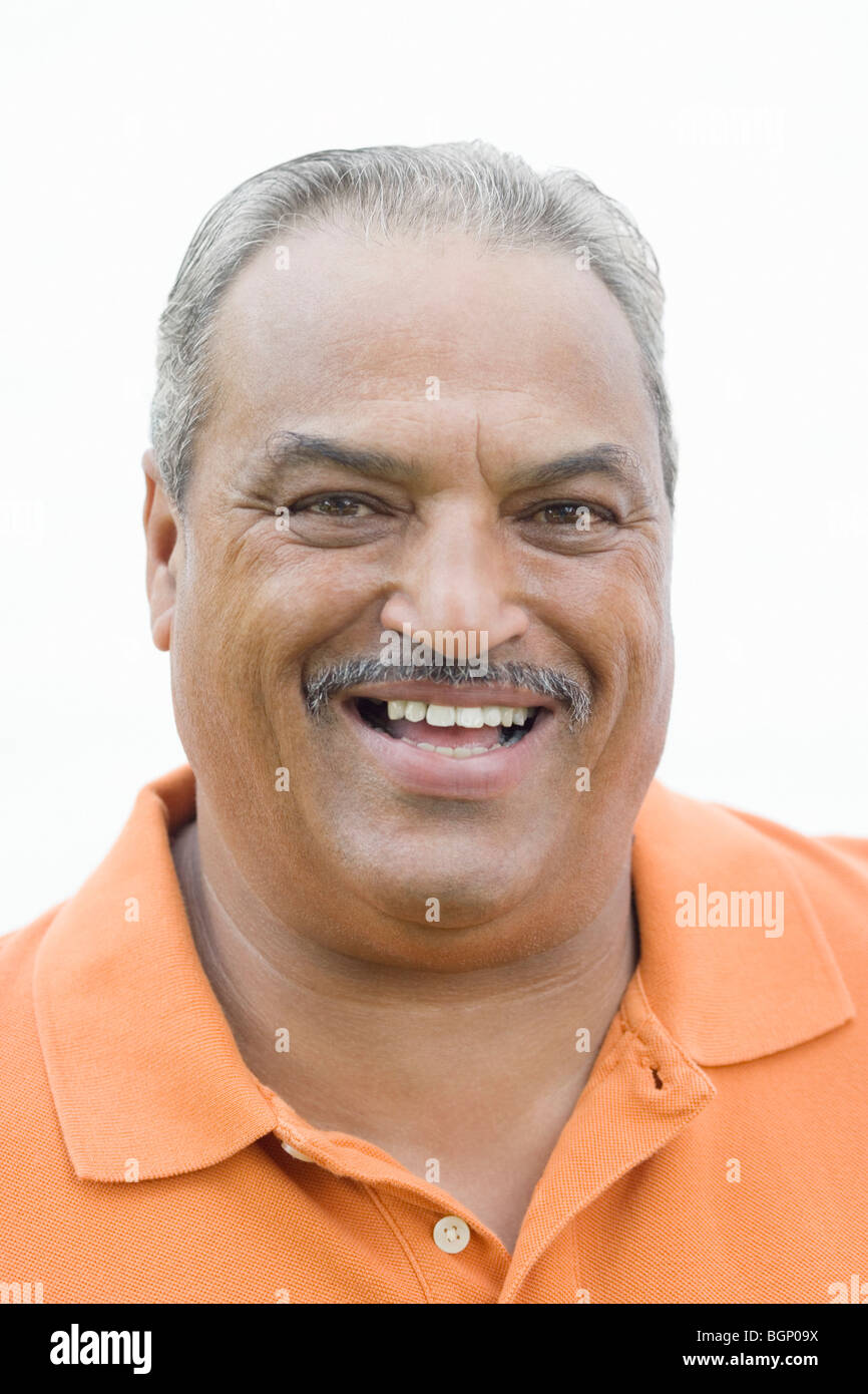 Portrait of a senior man smiling Stock Photo - Alamy