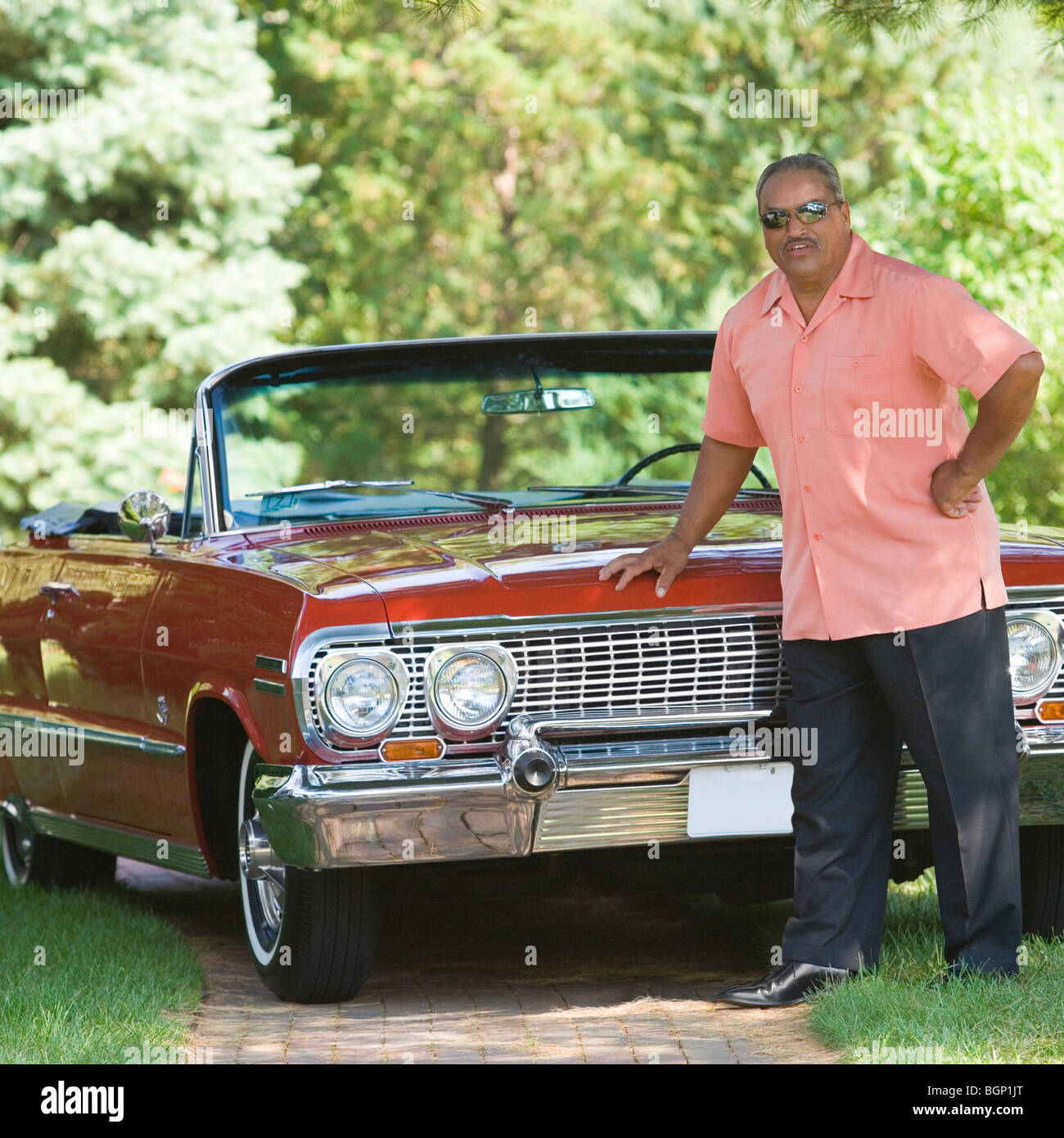 Leaning against convertible car hi-res stock photography and images - Alamy