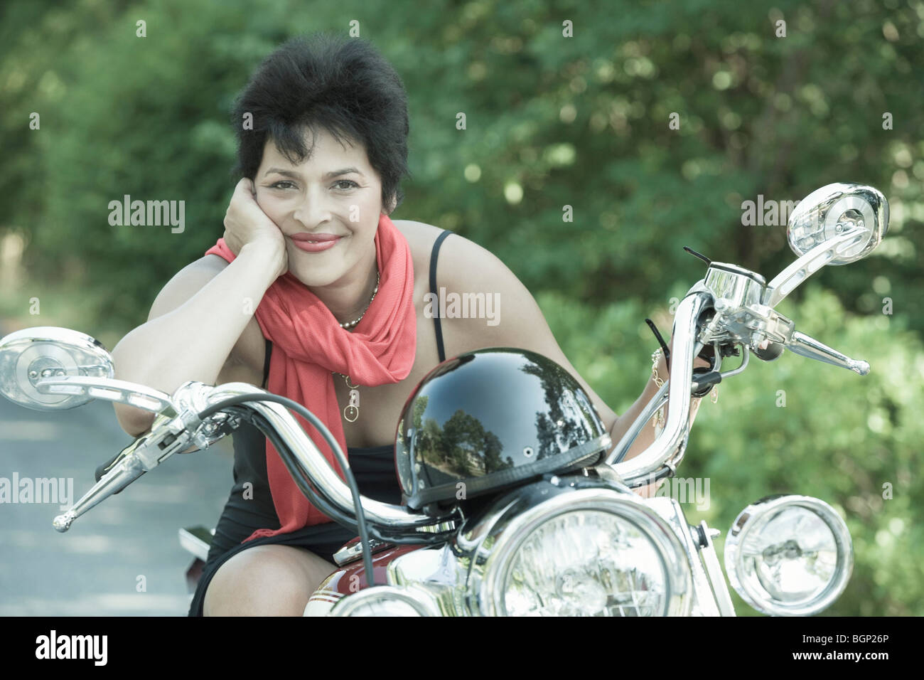 Mature woman sitting on motorcycle hi-res stock photography and images ...