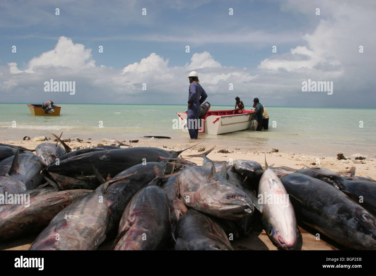 Fisherman on the beach on the island of Kiribati in the Pacific Ocean ...