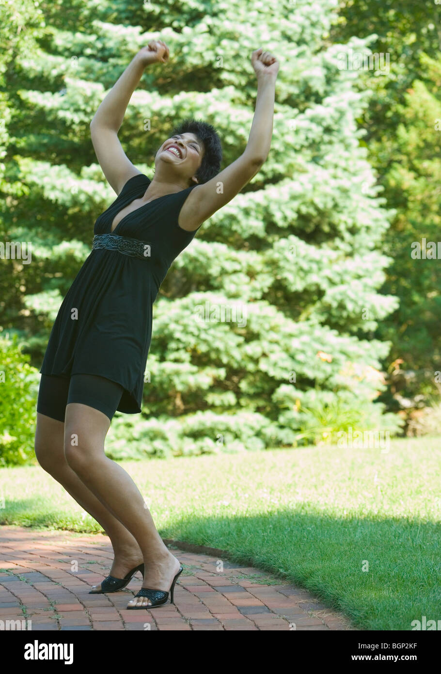 Woman cheering side view hi-res stock photography and images - Alamy
