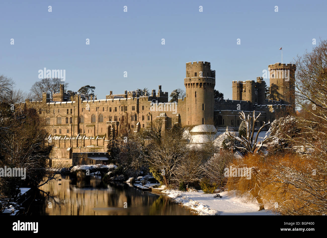 Warwick Castle and River Avon in winter with snow, Warwickshire ...