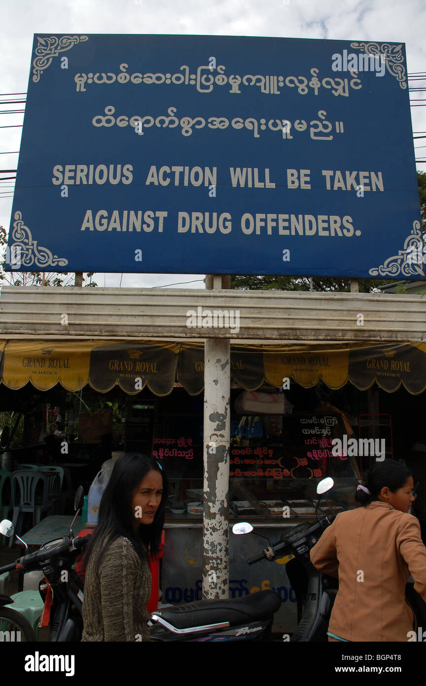 Burmese road signs and banners in Tachileik, MYANMAR Stock Photo - Alamy