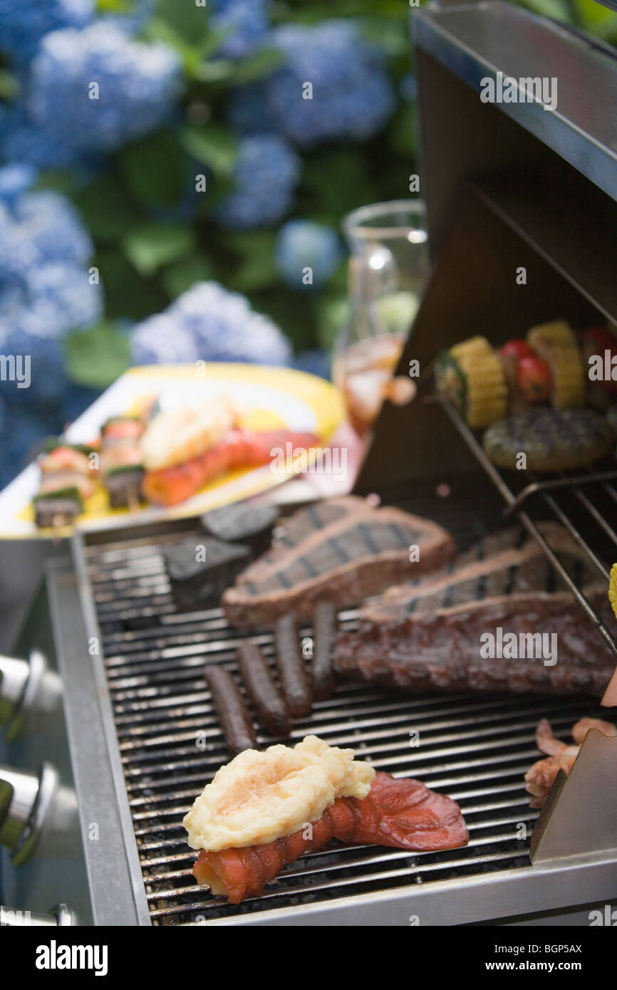 Close-up of meat slices grilled on a barbecue grill Stock Photo - Alamy