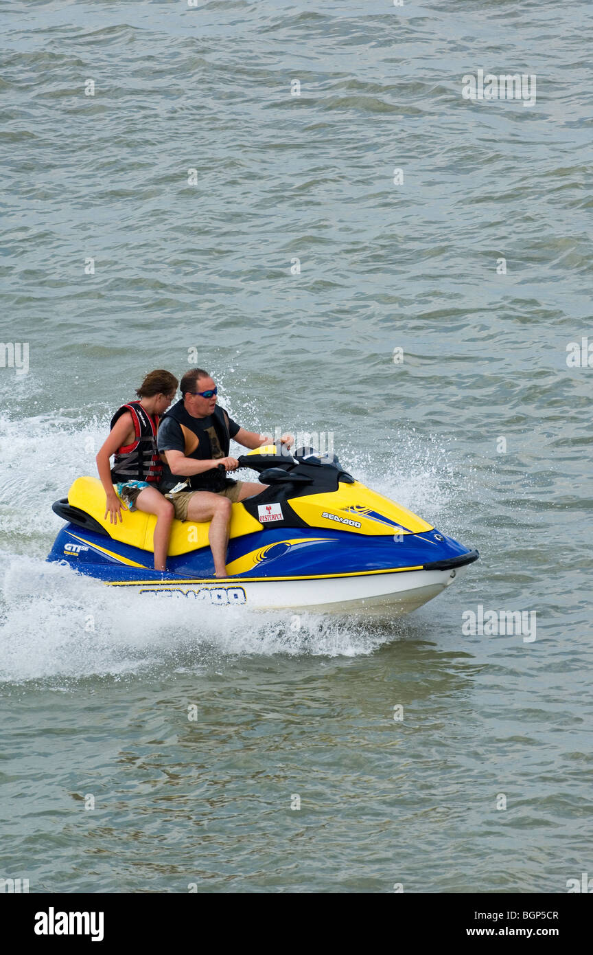 Two men riding jet ski hi-res stock photography and images - Alamy