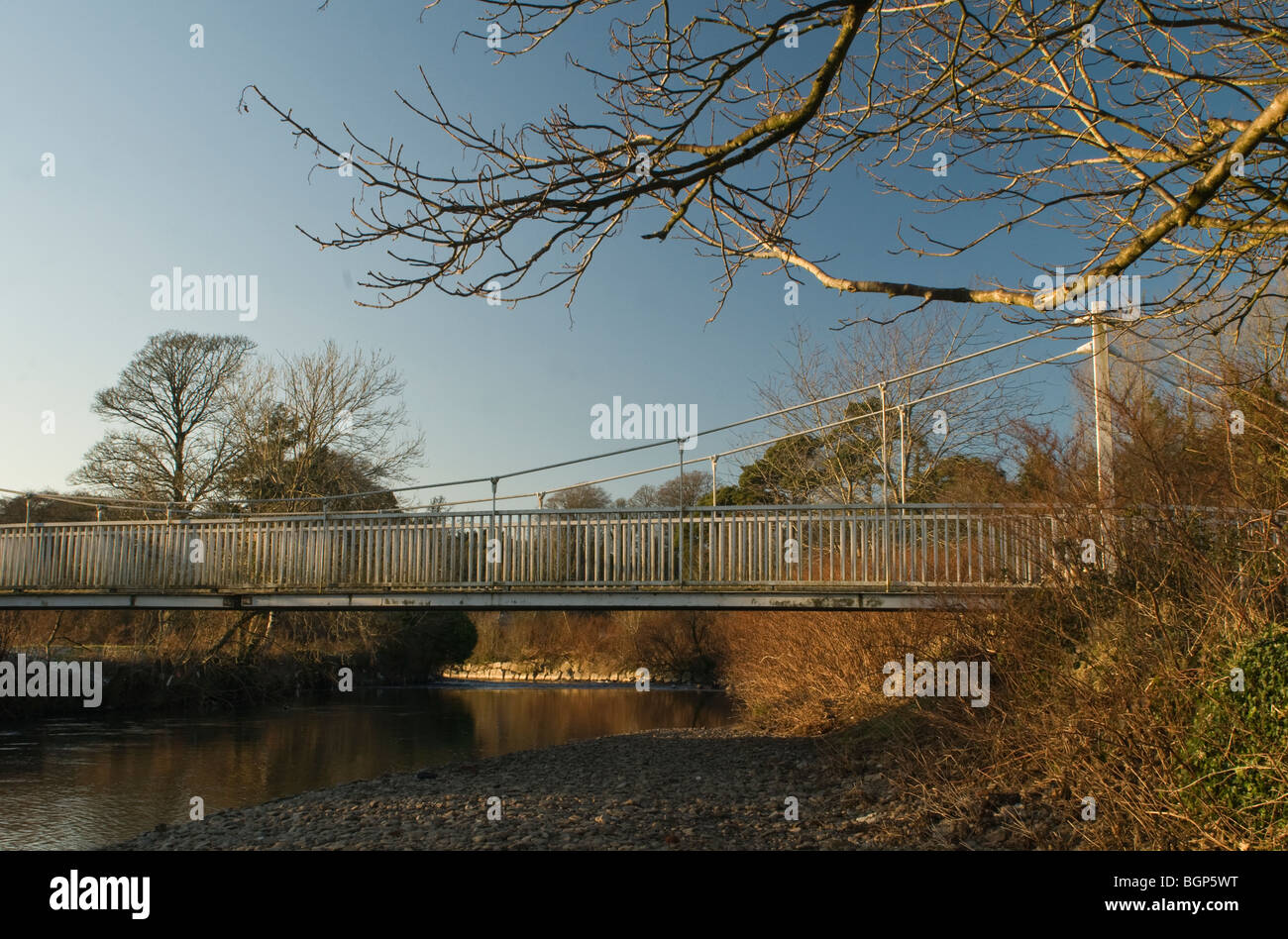 Suspension bridge carrying public footpath over the River Ogmore at ...
