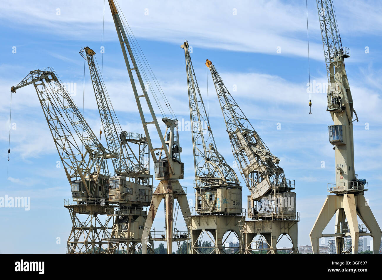 Historic dock cranes at the shipping trade museum along the docks in the port of Antwerp ...