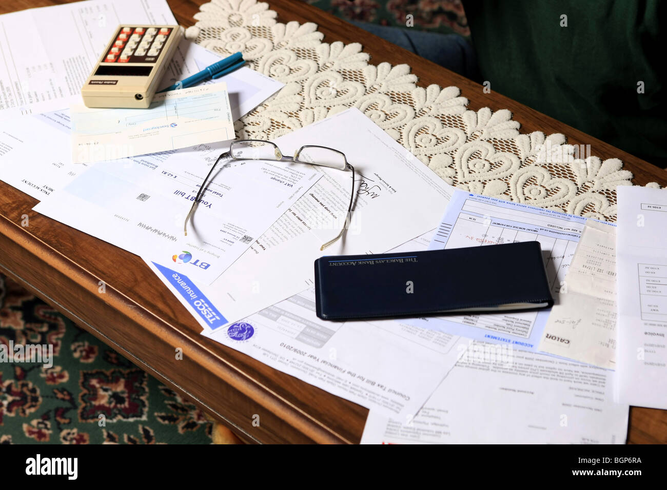 Calculator cheque book hi-res stock photography and images - Alamy