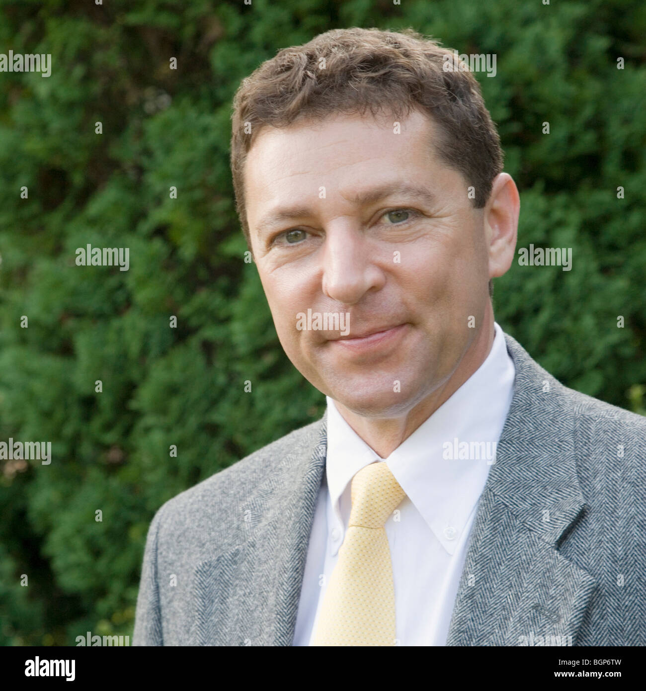 Portrait businessman smirking hi-res stock photography and images - Alamy