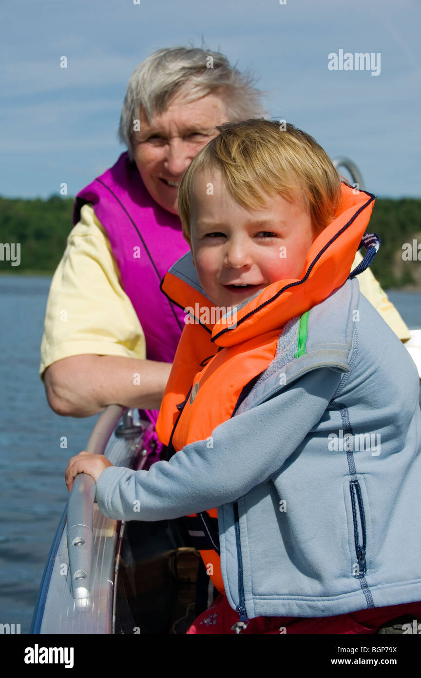 Family rides on boat hi-res stock photography and images - Alamy