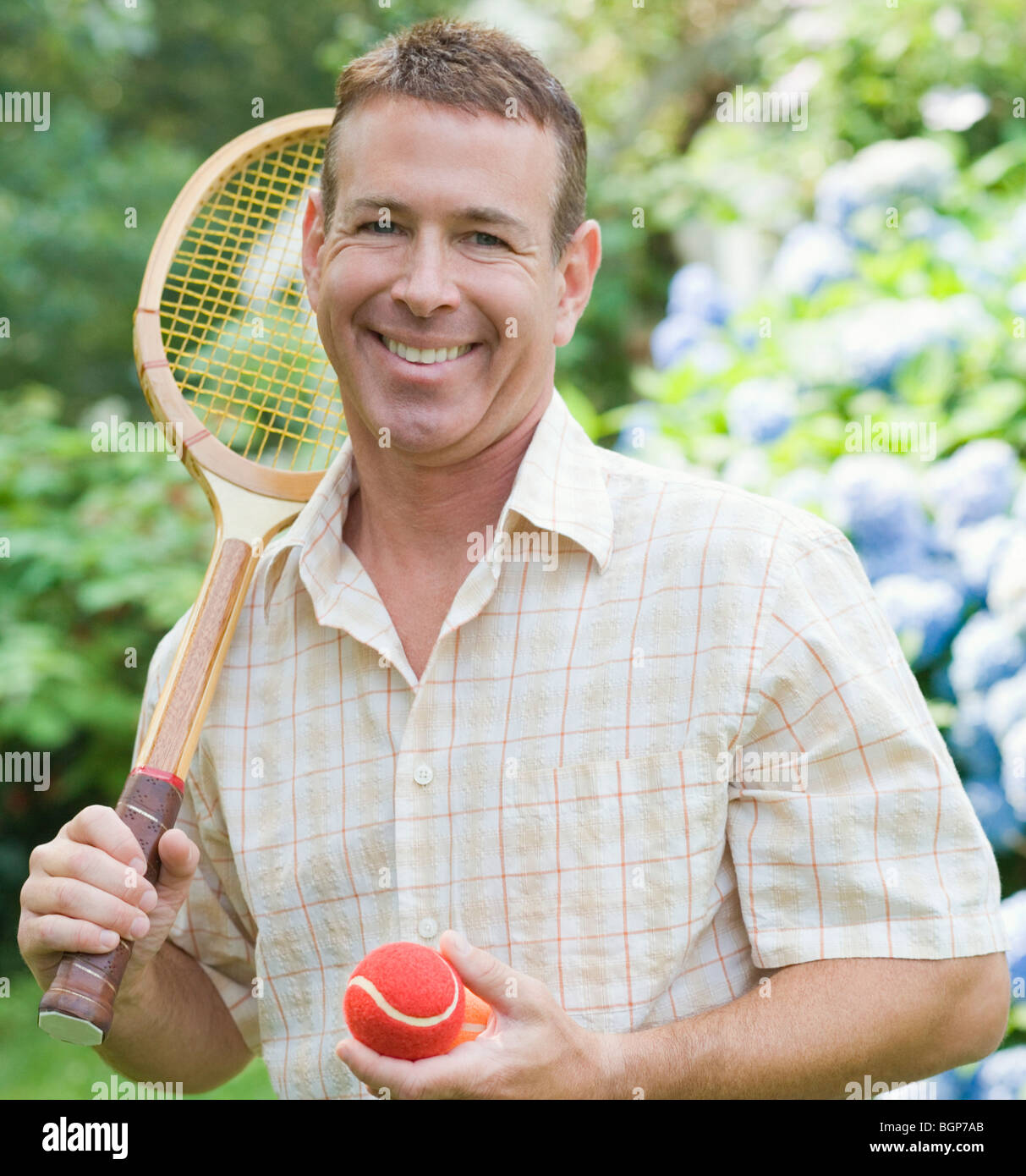 Close up of person holding tennis balls hi-res stock photography and ...