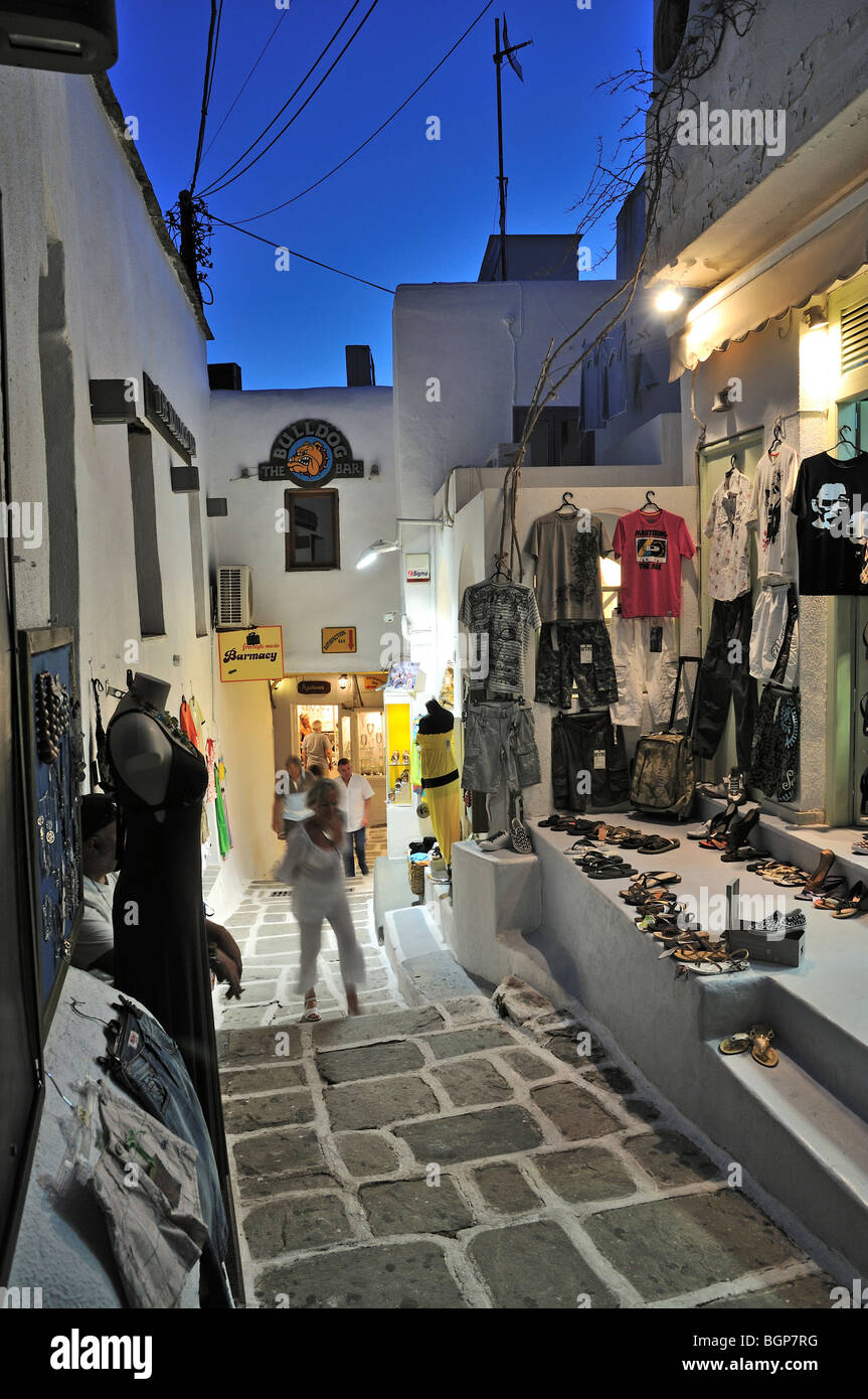 Traditional shopping area during dusk time, Chora (main town), Ios ...