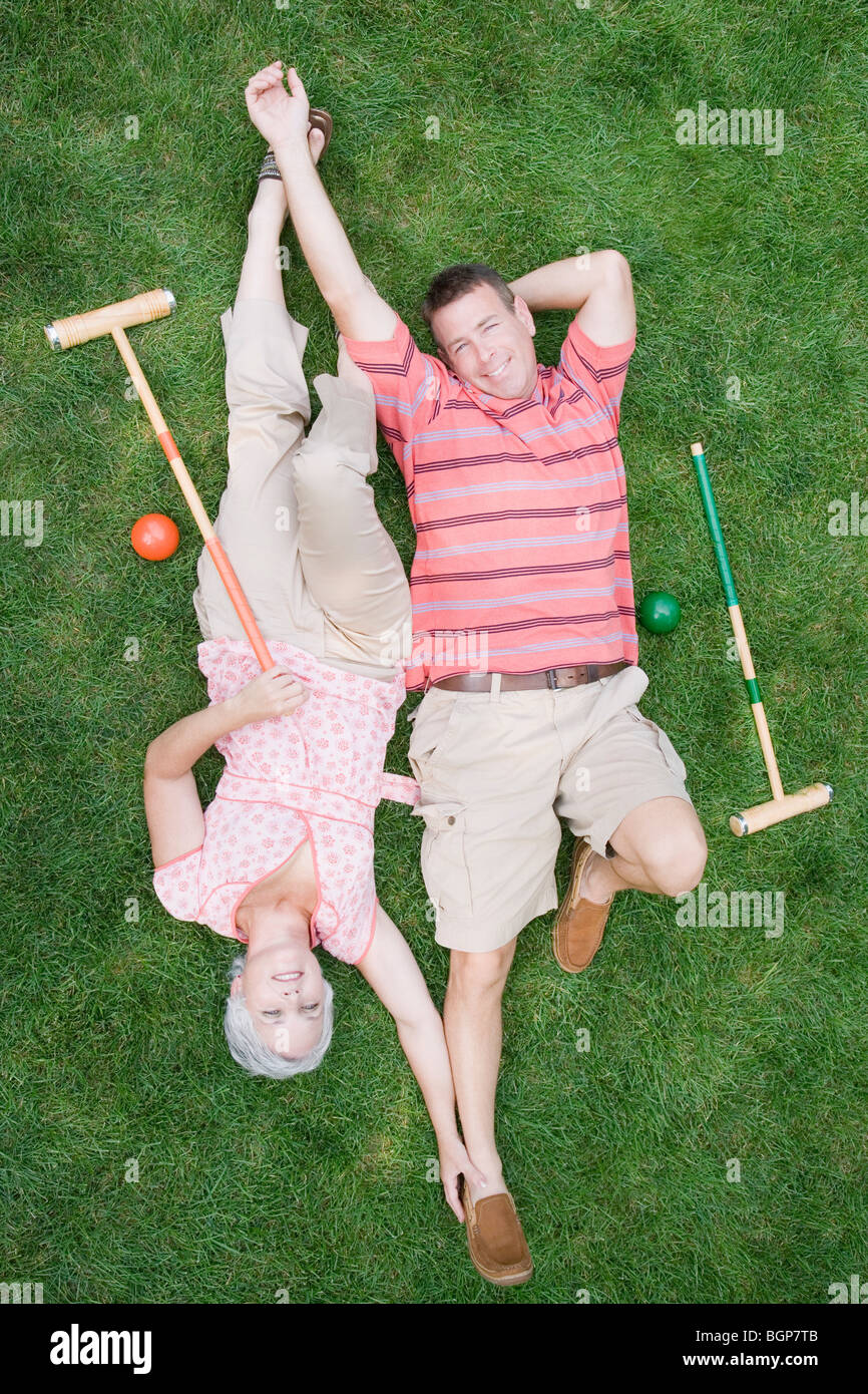 Two people napping on lawn hi-res stock photography and images - Alamy