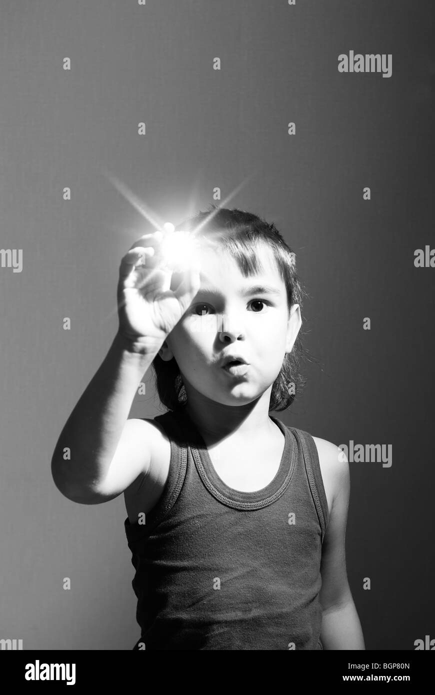 young boy holding a star in the hand Stock Photo - Alamy