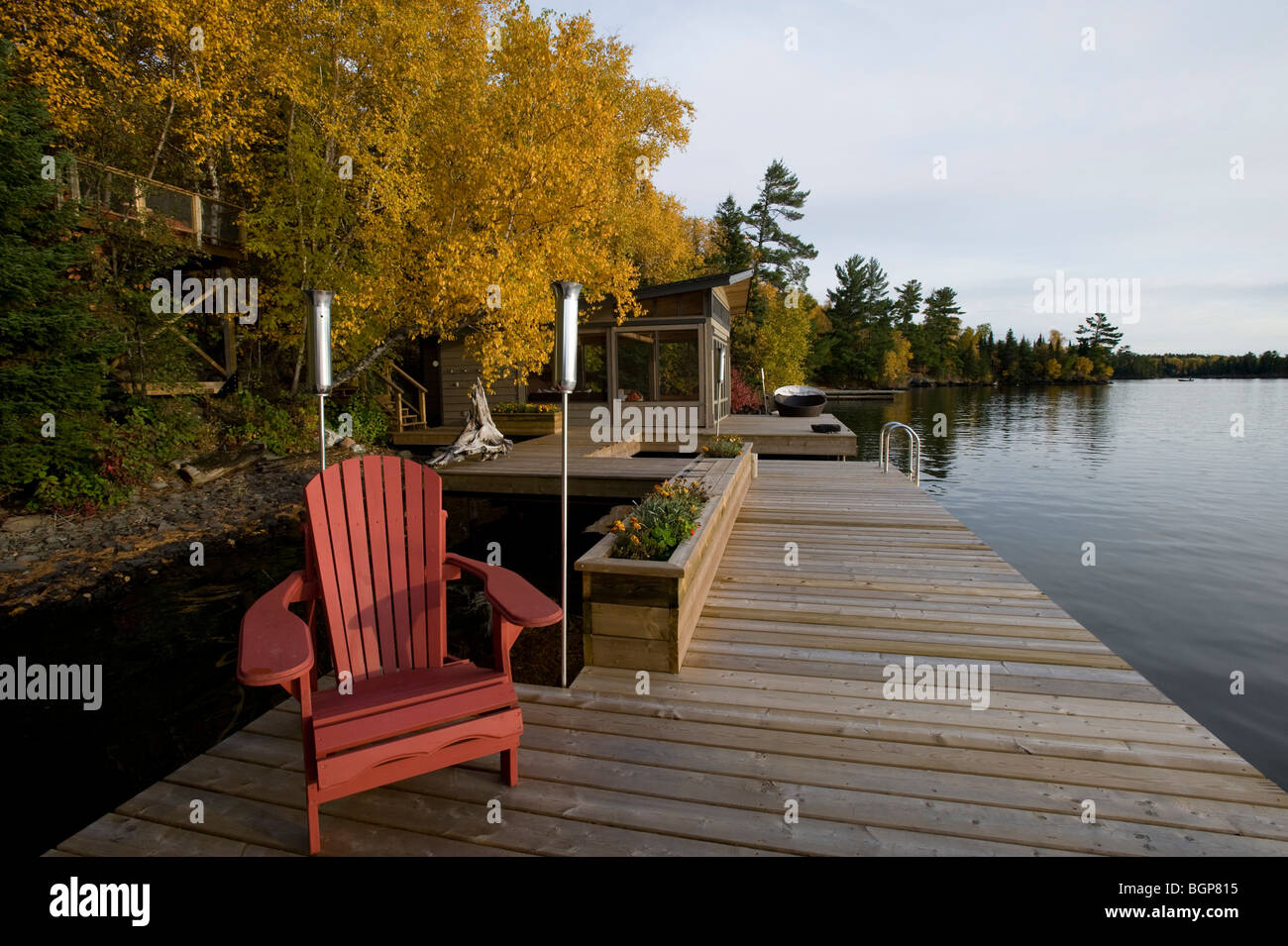 Cottage dock and autumn foliage, Lake of the Woods, Ontario, Canada ...