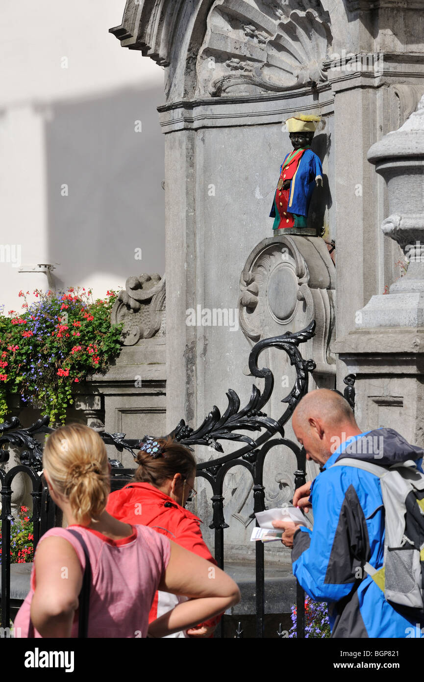 Fountain statue Little Man Pee / Petit Julien / Manneken Pis dressed in ...