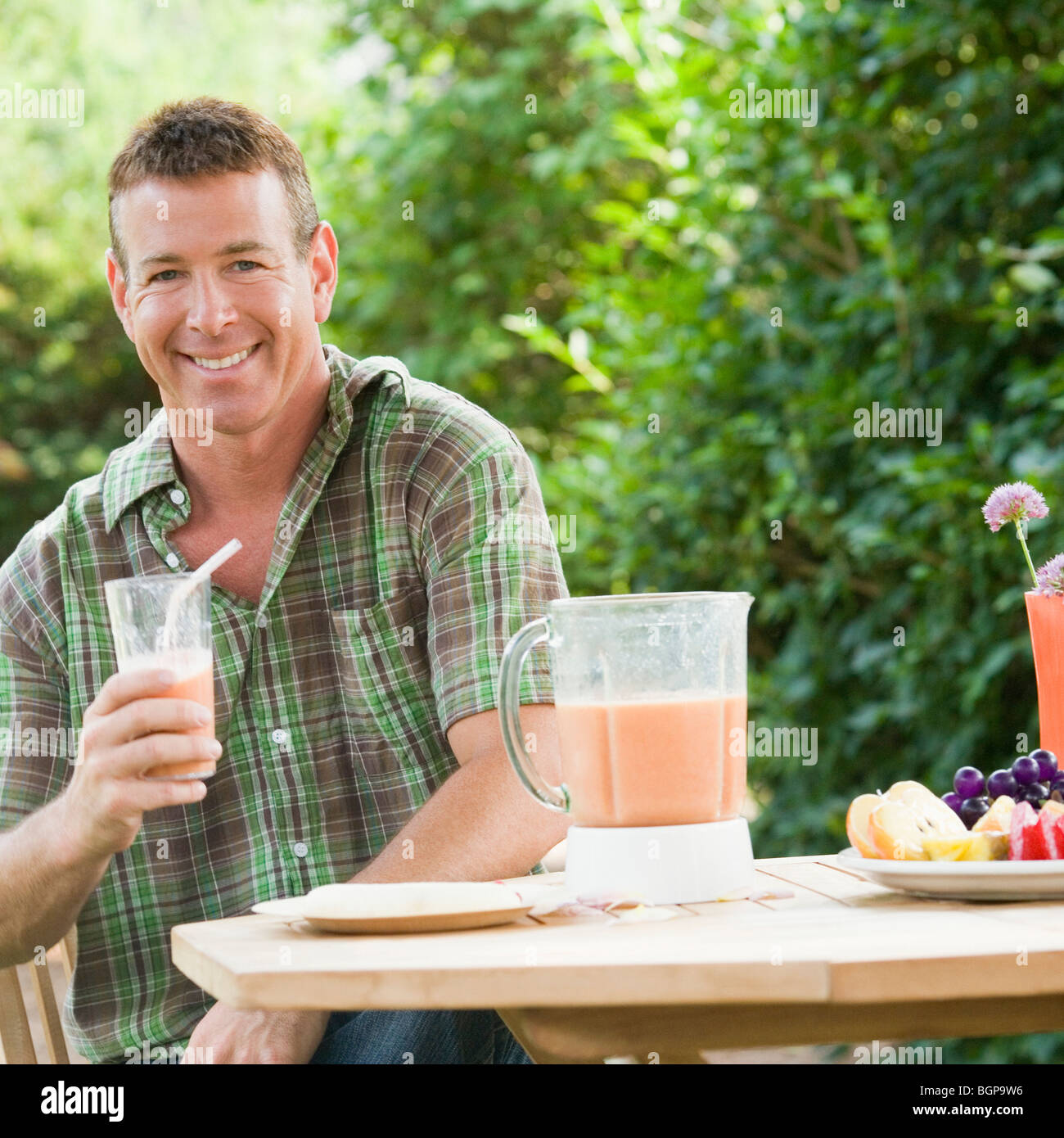 Man drinking glass apple juice hi-res stock photography and images - Alamy