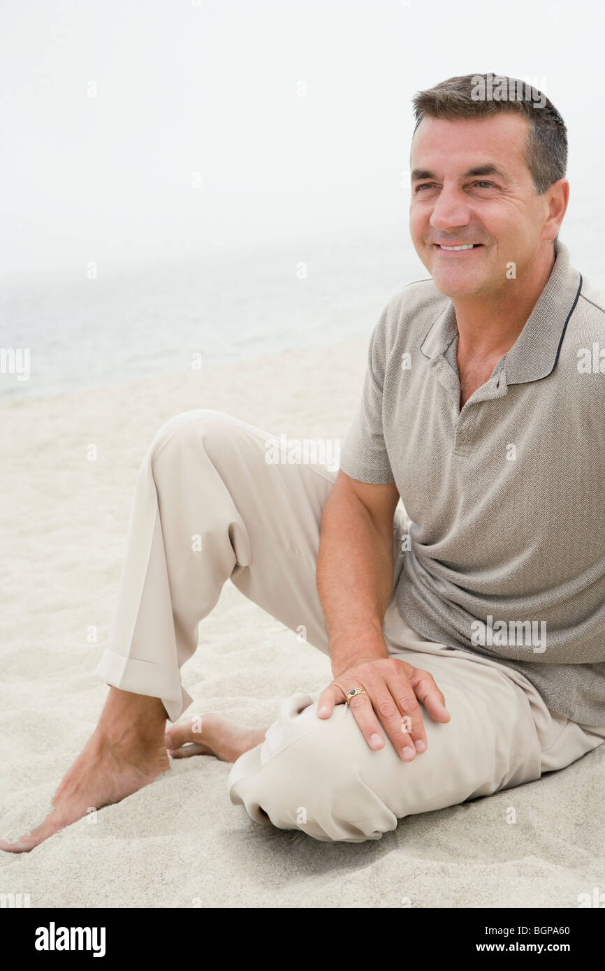 Contemplative mature man water hi-res stock photography and images - Alamy