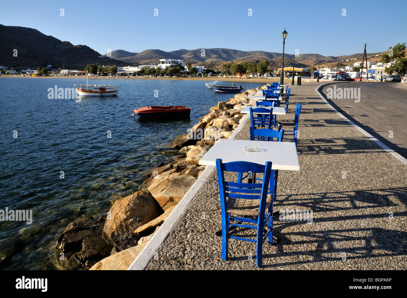 Silhouettes and light, port of Ios island, Greece Stock Photo - Alamy