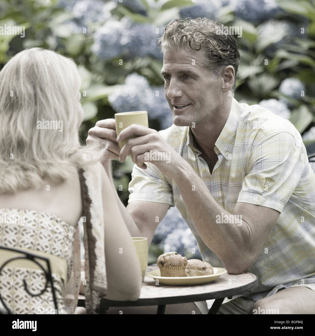 Two couple tea cupcake hi-res stock photography and images - Alamy