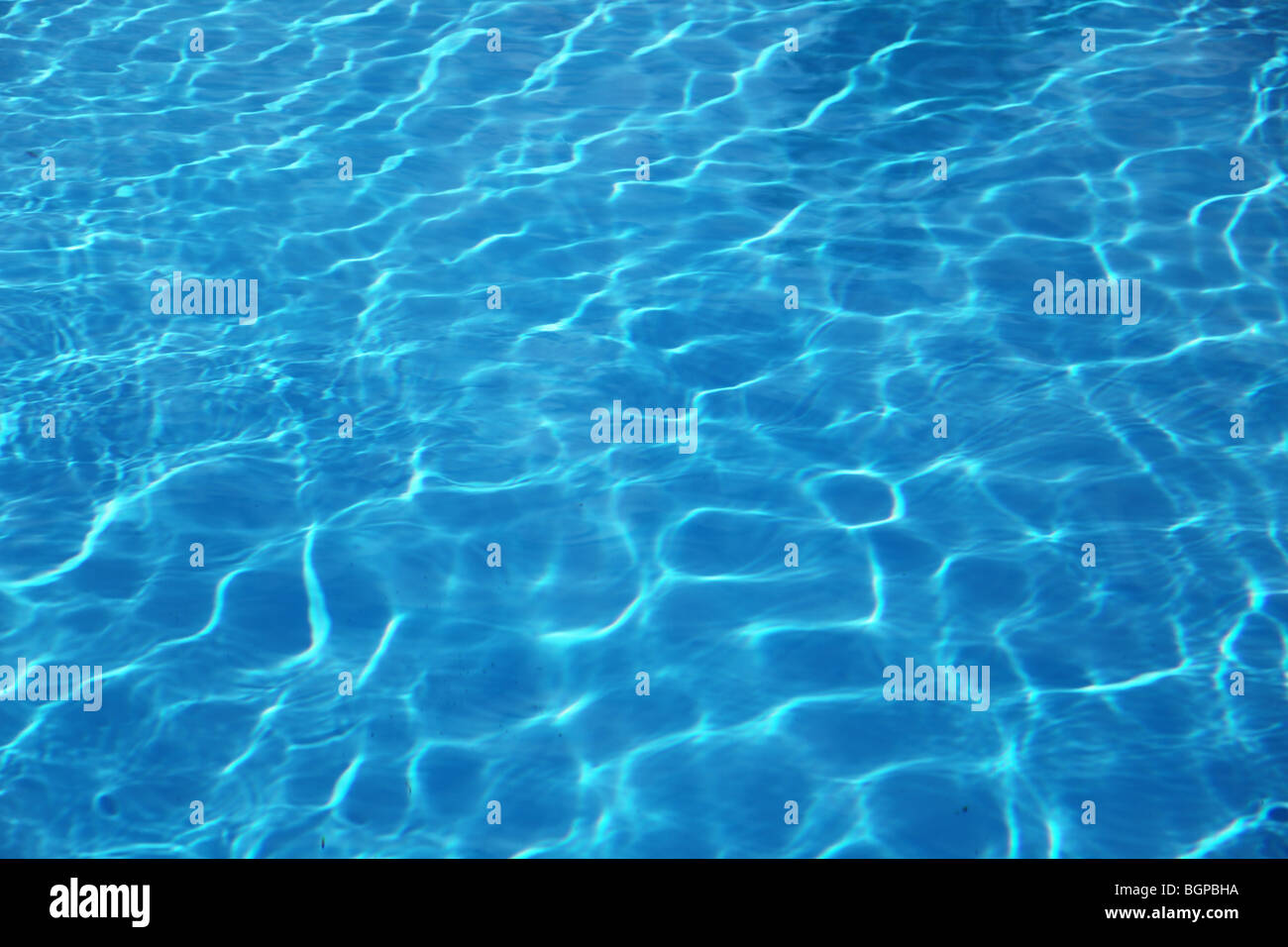 The surface of a shiny blue swimming pool Stock Photo - Alamy