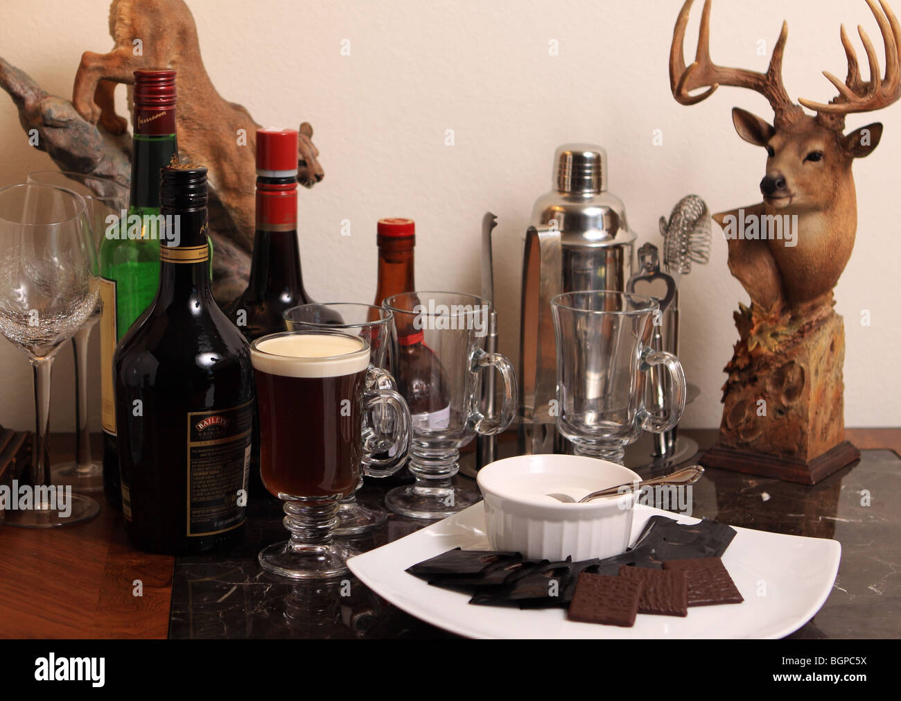 Irish Coffee with after dinner mints on a cocktail drinks table Stock ...