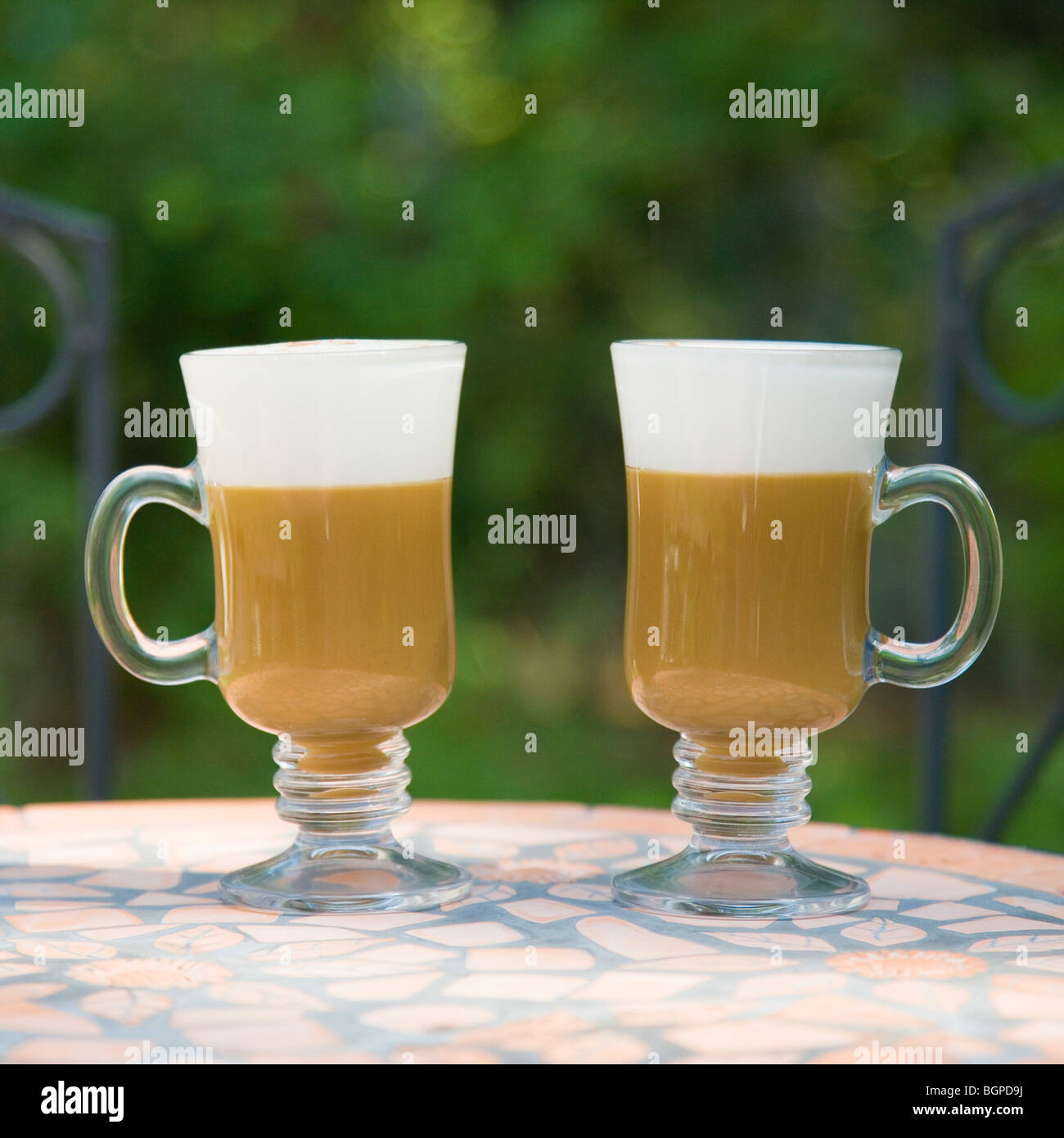 Close-up of two coffee cups on a table Stock Photo - Alamy