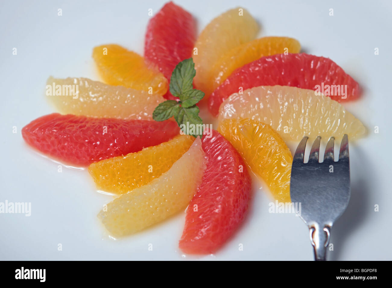 Citrus fruit cocktail segments Stock Photo - Alamy
